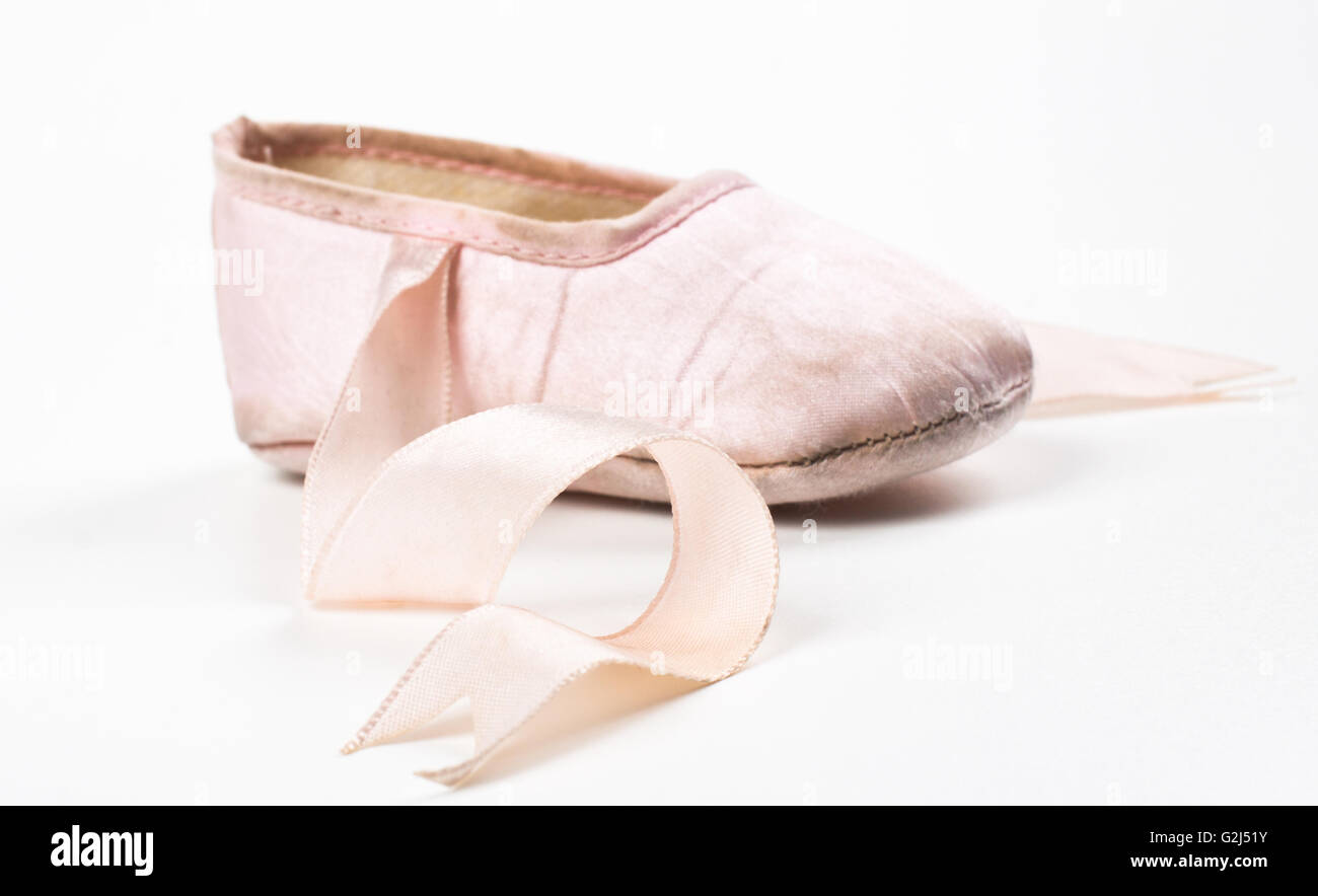 single pink balerina shoe close-up isolaed on white Stock Photo - Alamy