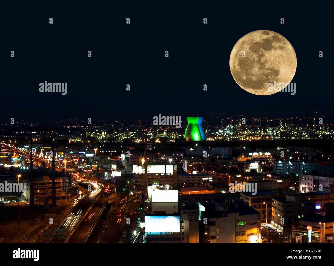haifa bay industrial zone with a highway and giant moon above Stock ...