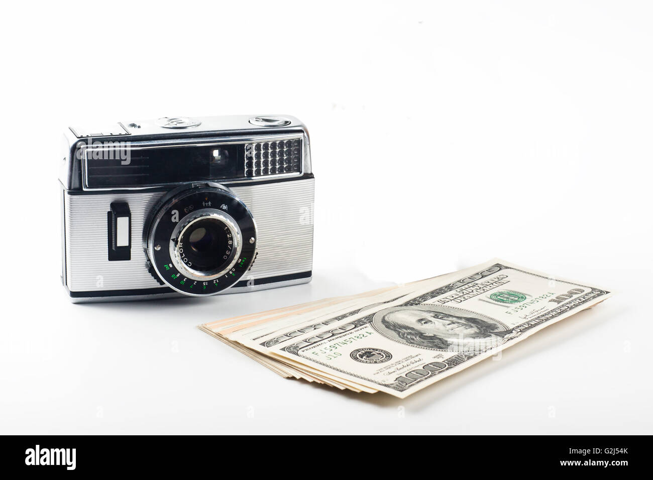 dollars old camera and a globus travel destinations Stock Photo - Alamy