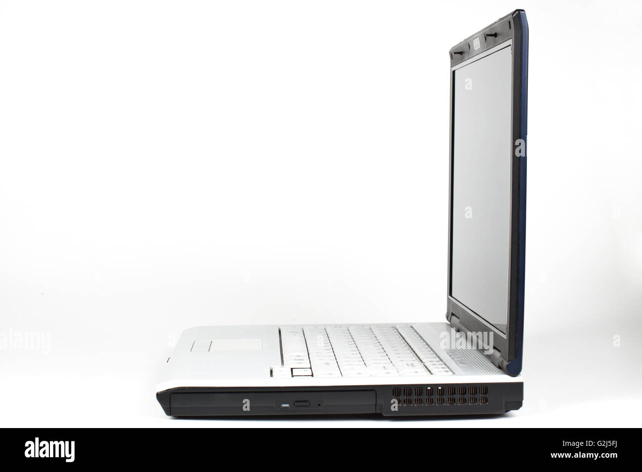 Laptop side view isolated on white background Stock Photo - Alamy
