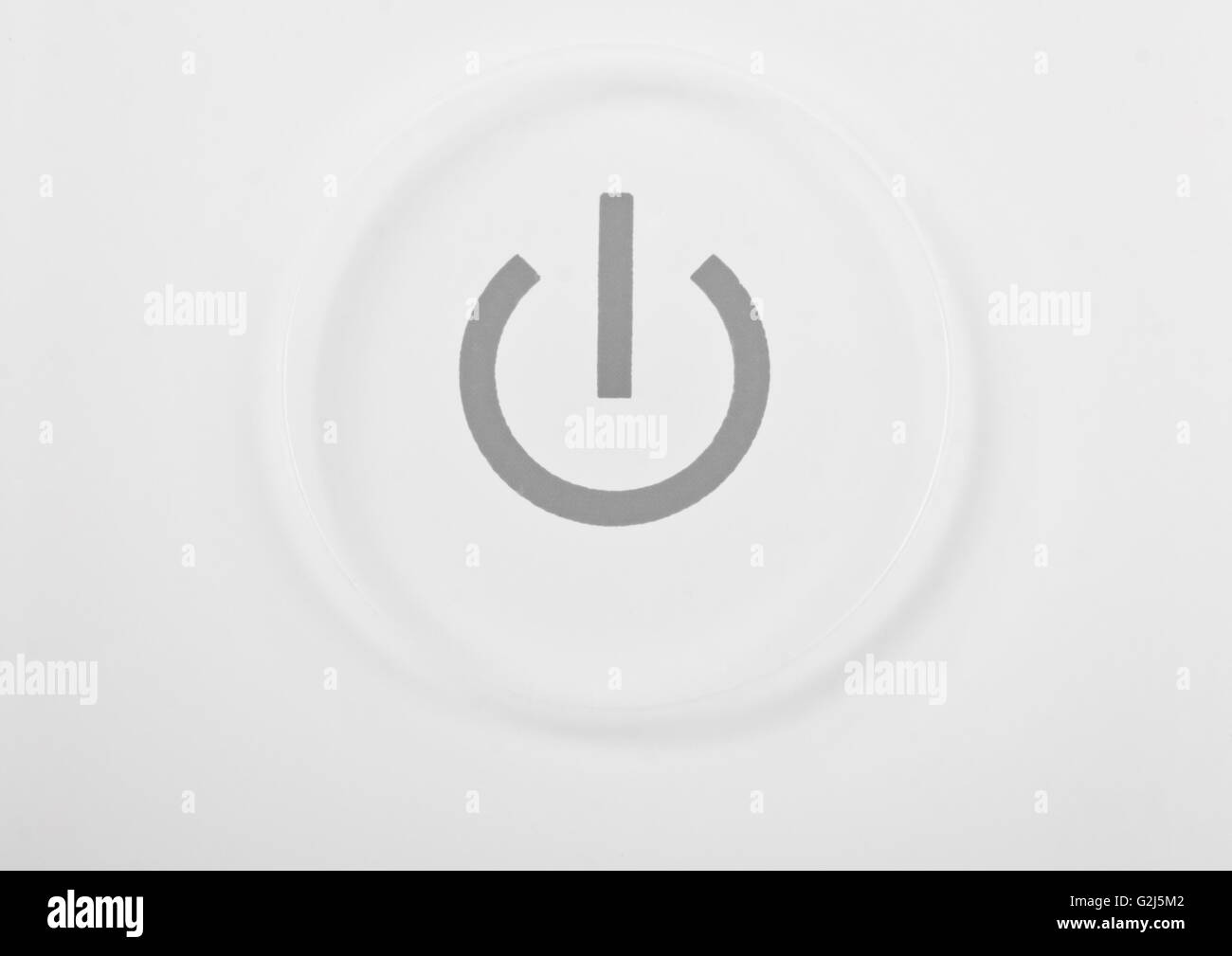 White power button macro close-up Stock Photo - Alamy