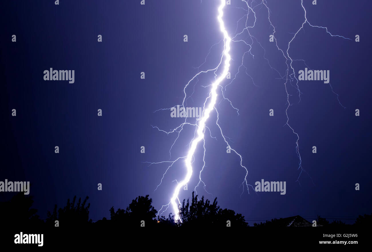 storm lightning from sky to earth at night Stock Photo - Alamy