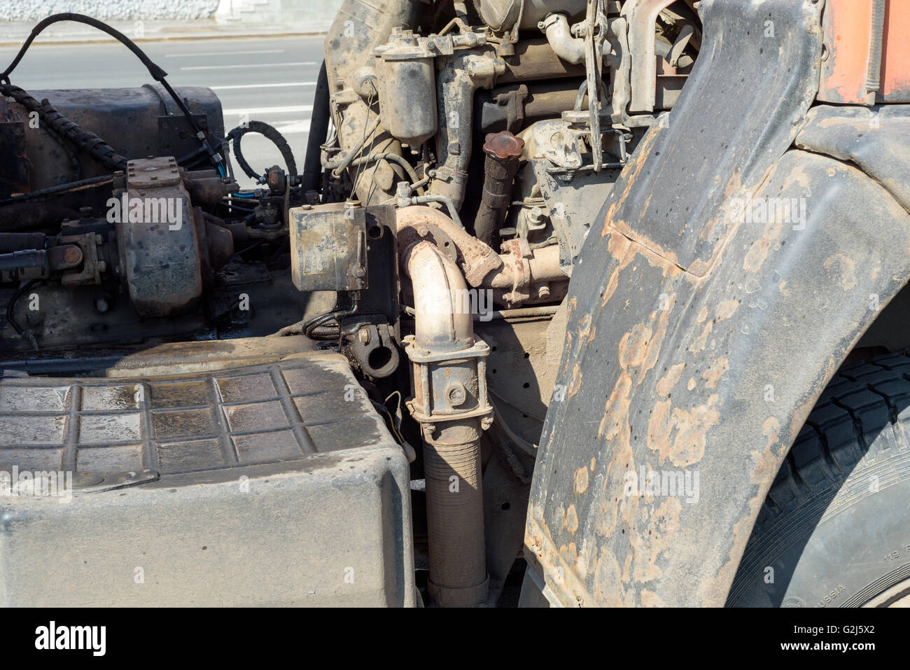Grimy oil stained engine exterior of a Russian Kamaz vehicle Stock ...