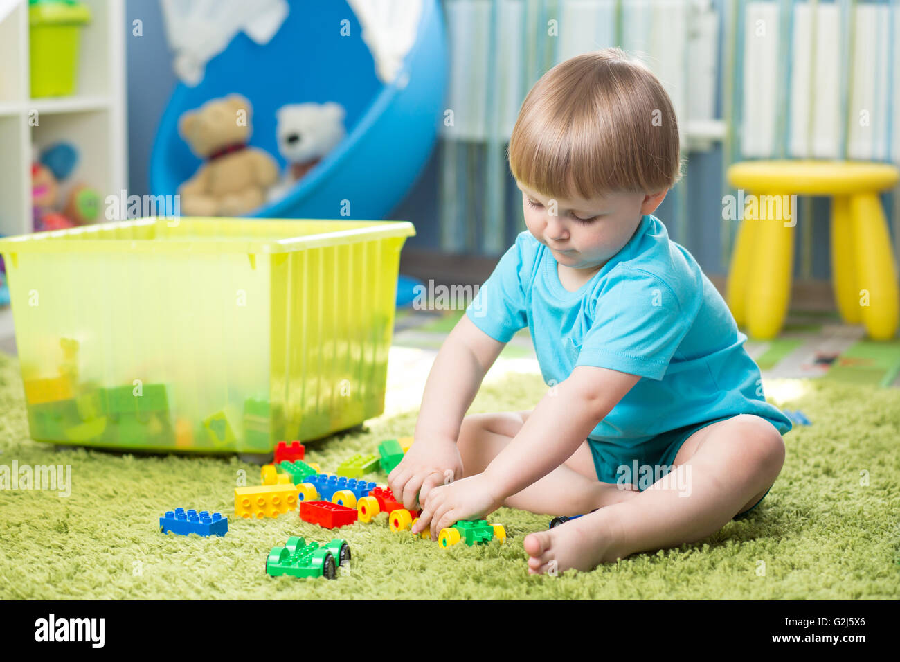 Boy build blocks hi-res stock photography and images - Alamy