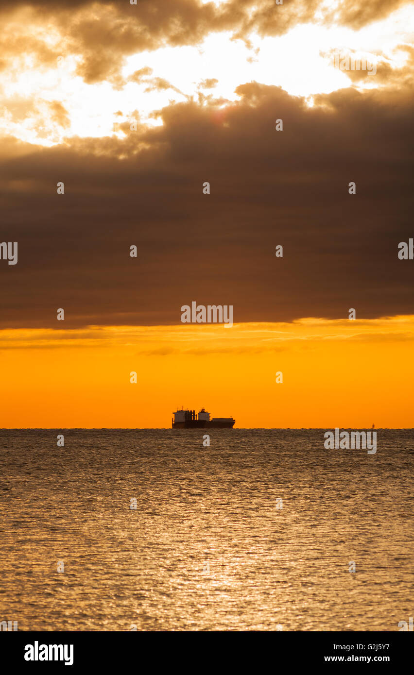 View ship in the Trieste sea at sunset Stock Photo - Alamy