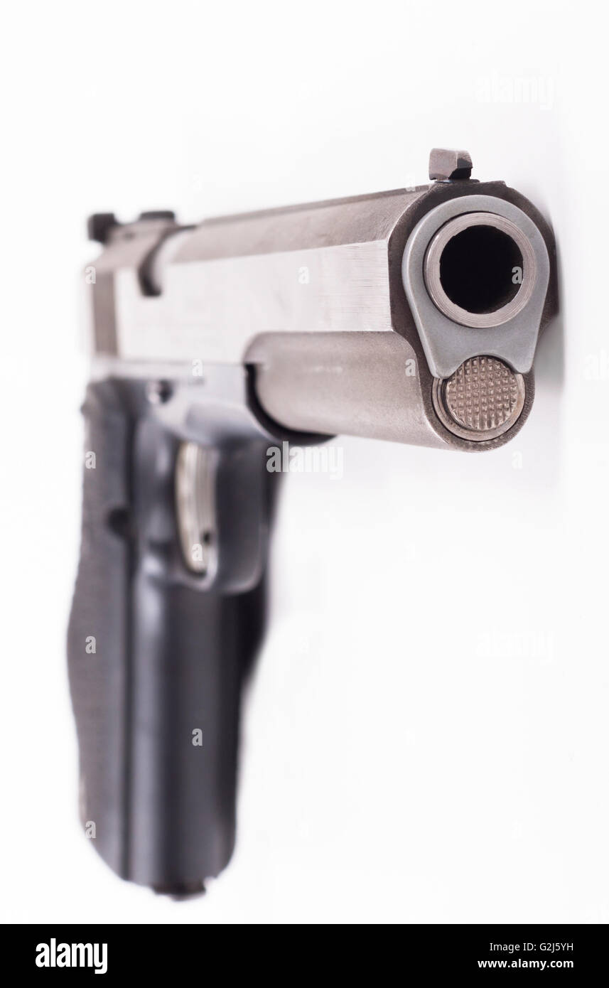 Silver color pistol closeup isolated on white background Stock Photo ...