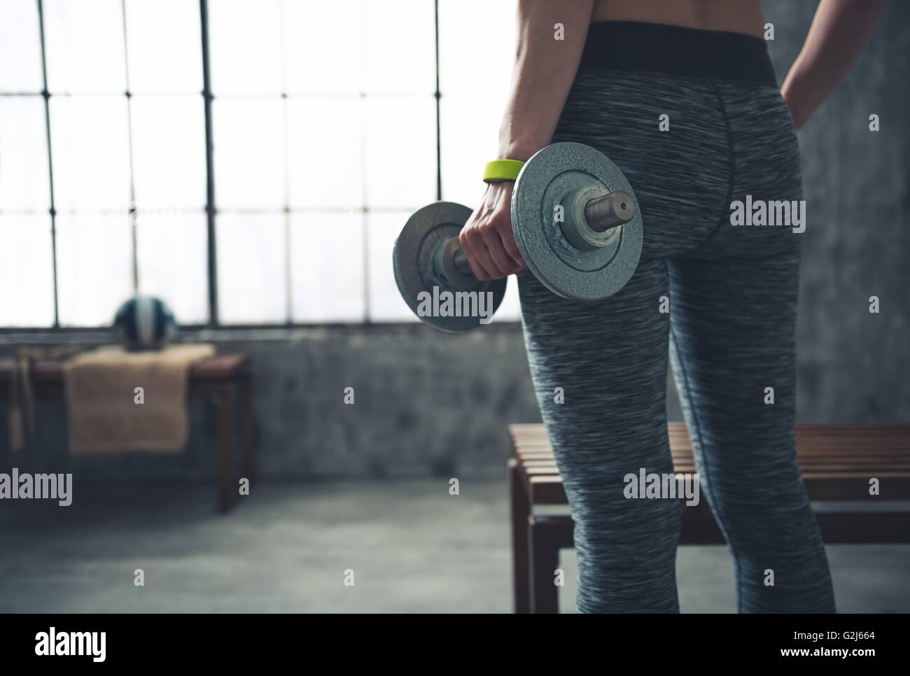 Body and mind workout in loft fitness studio. Closeup on fitness woman ...