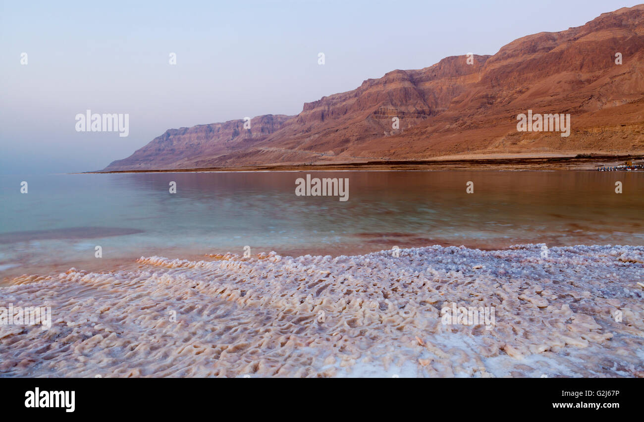 Dead sea lanscape with salt structures on the shore and desert ...