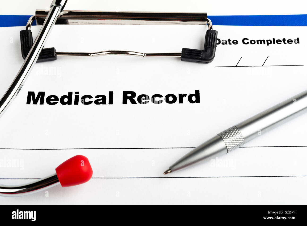 Red Stethoscope On Blue Clipboard With Medical Record Close Up With