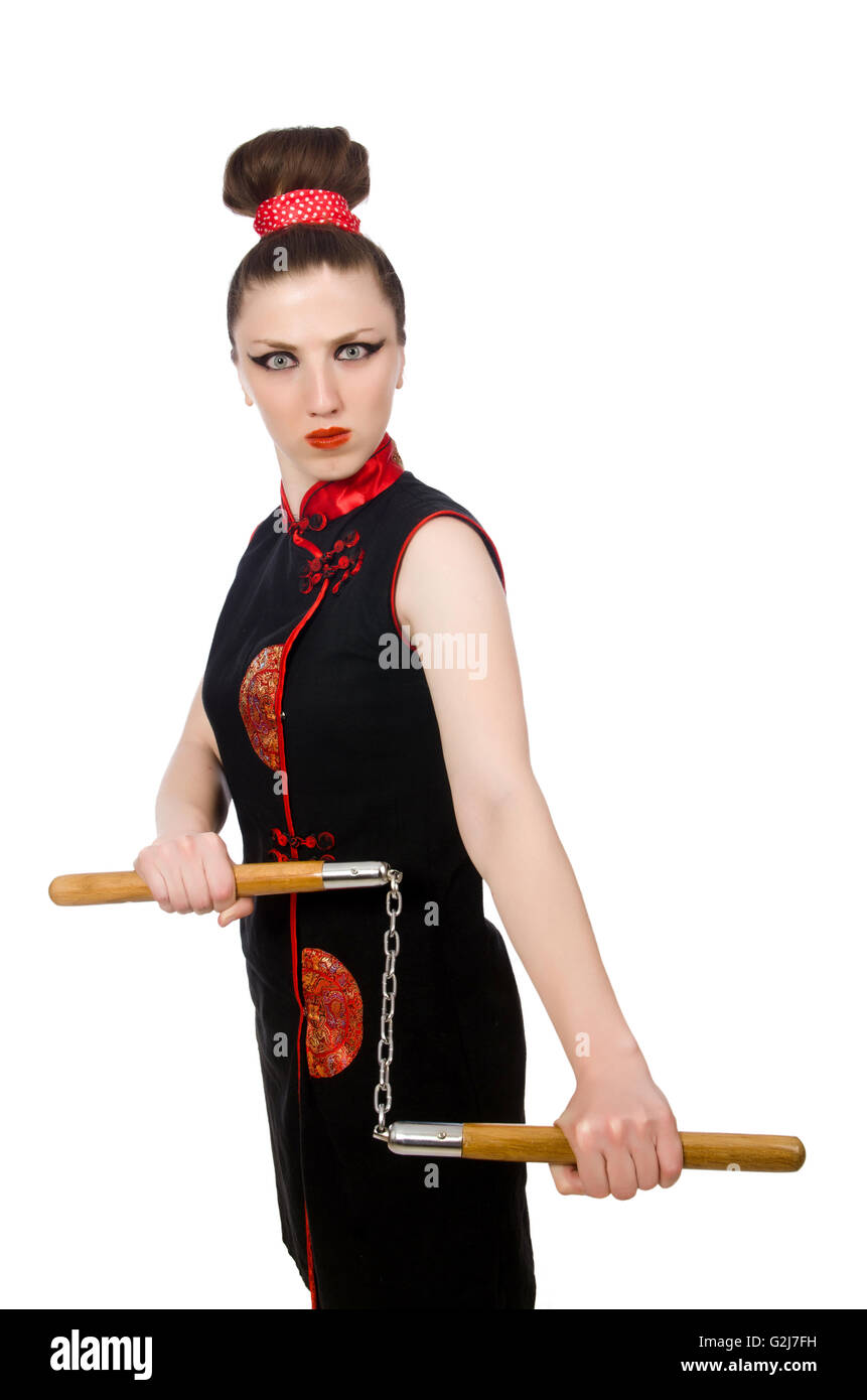 Funny woman with nunchucks isolated on white Stock Photo - Alamy