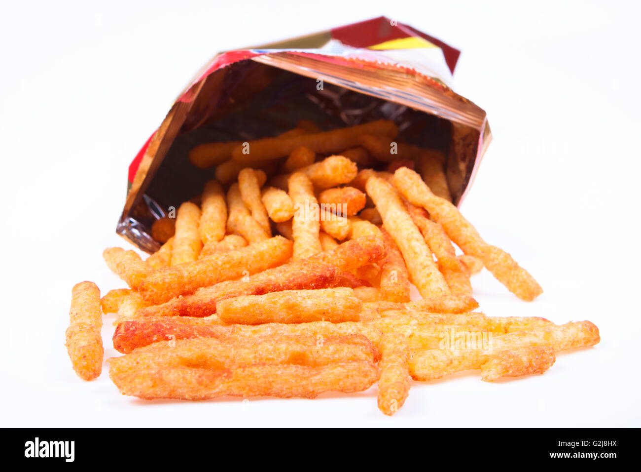 spicy french fries snacks in a abag on white background Stock Photo - Alamy
