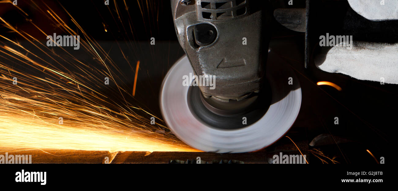 closeup to a grinder sparks all over wide landscape image Stock Photo ...
