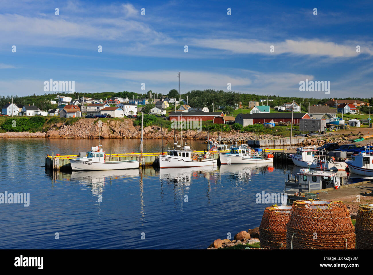 Fishing boats in Cabot Strait Neils Harbour Nova Scotia Canada Stock ...