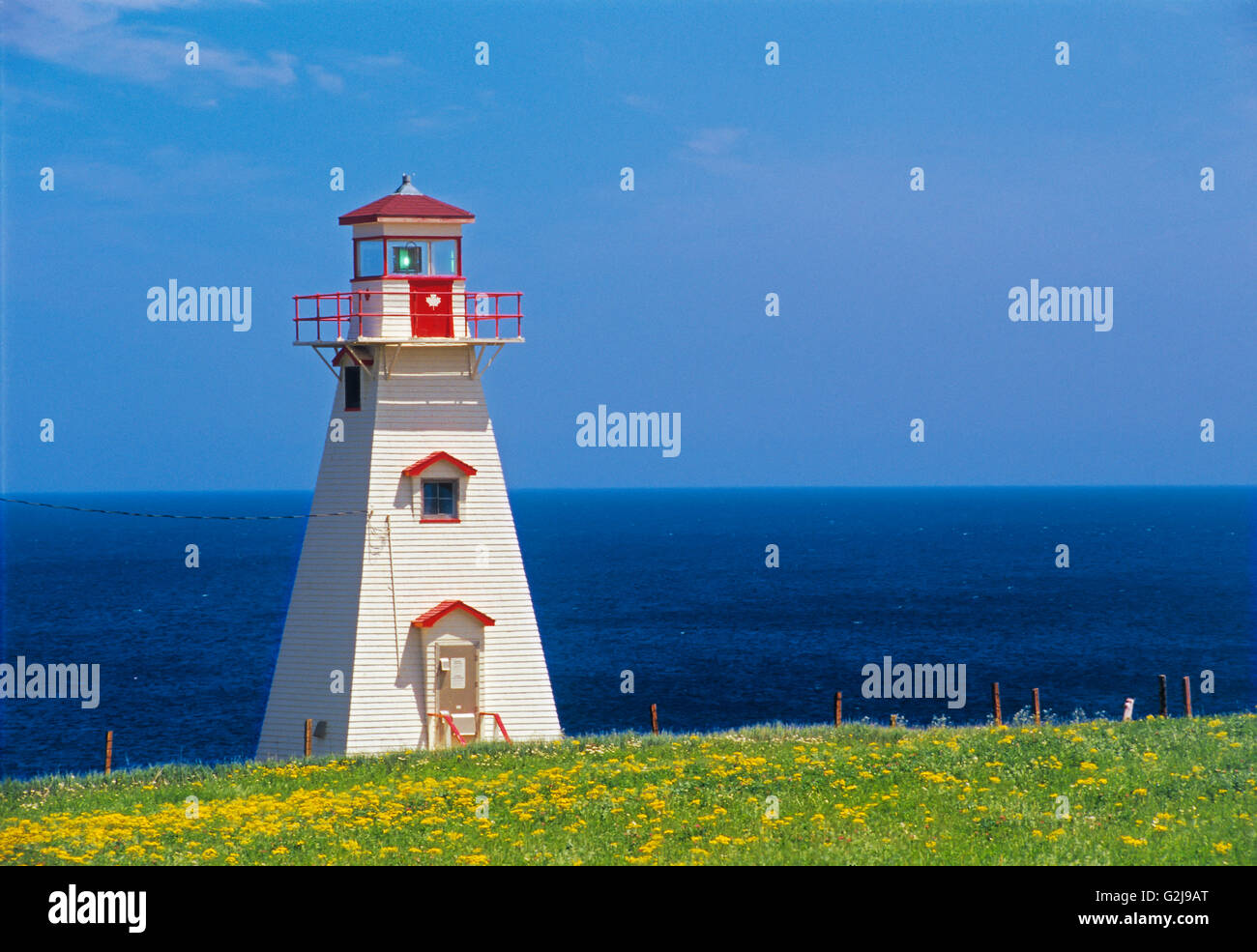 Lighthouse by the Atlantic Ocean Stock Photo - Alamy