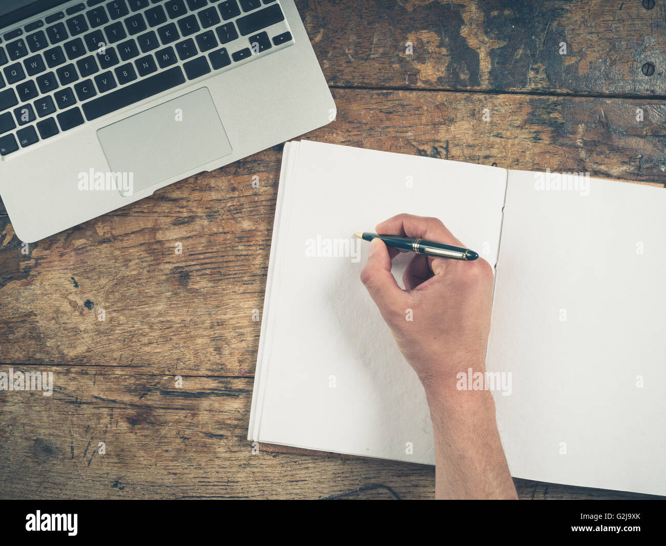 Hand pen overhead hi-res stock photography and images - Alamy