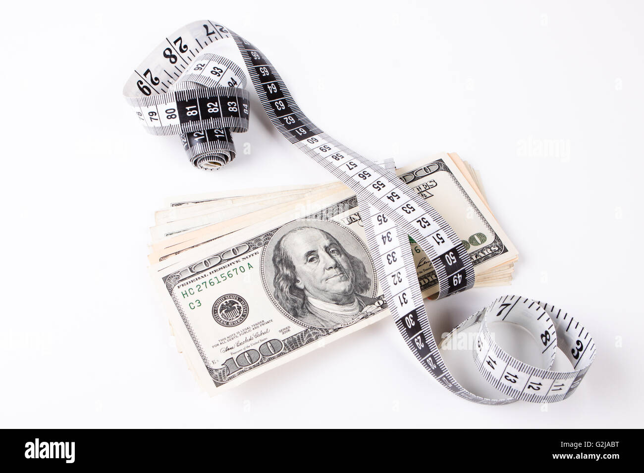 dollar mesure with meter on white background Stock Photo - Alamy
