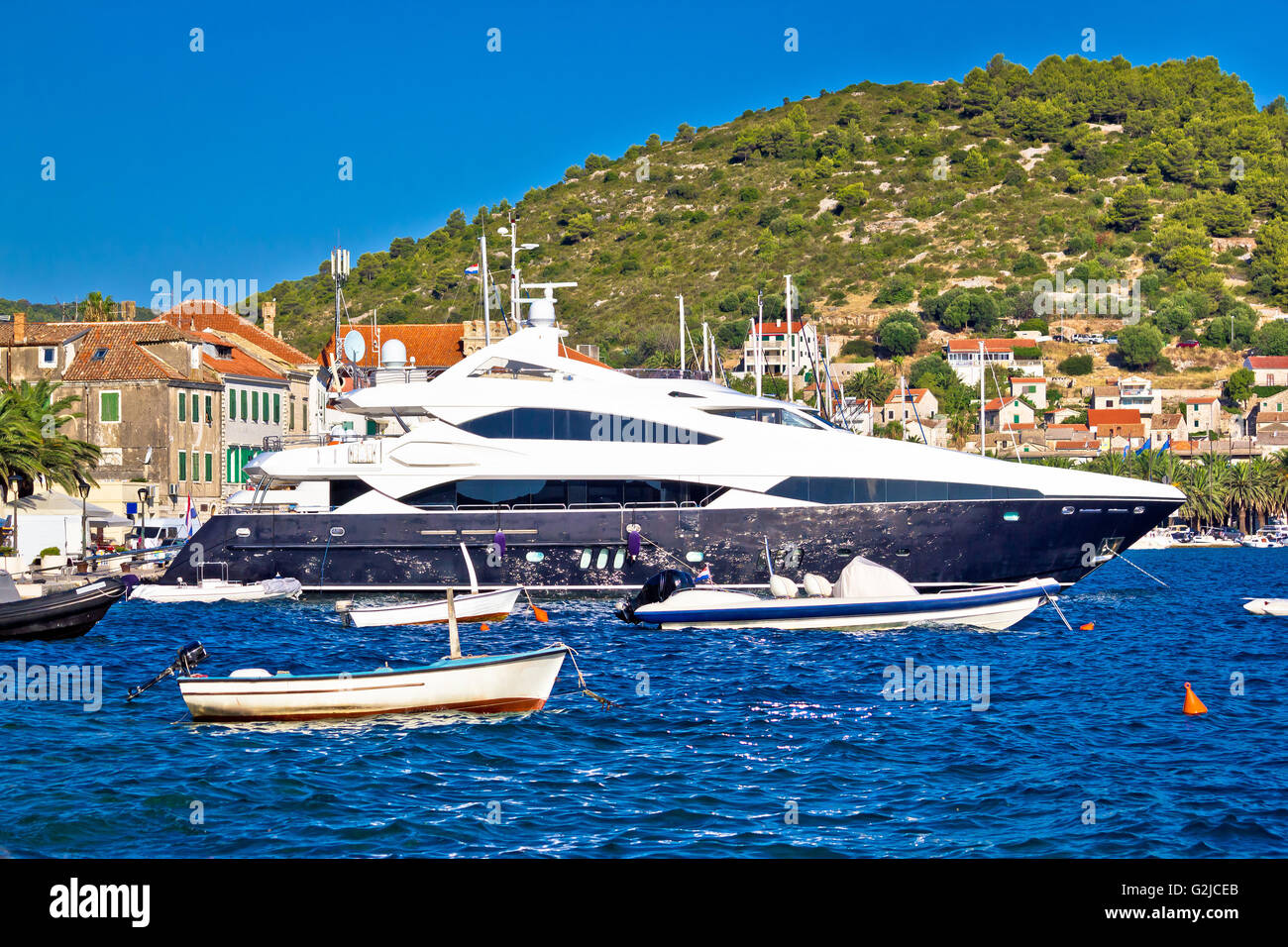 Luxury yachts in Vis harbor summer view, famous tourist destination of ...