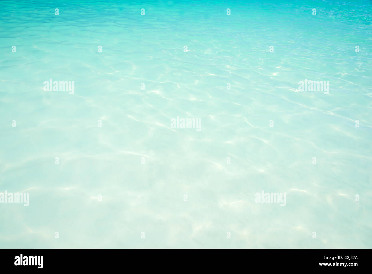 Turquoise translucent water sea background Stock Photo - Alamy