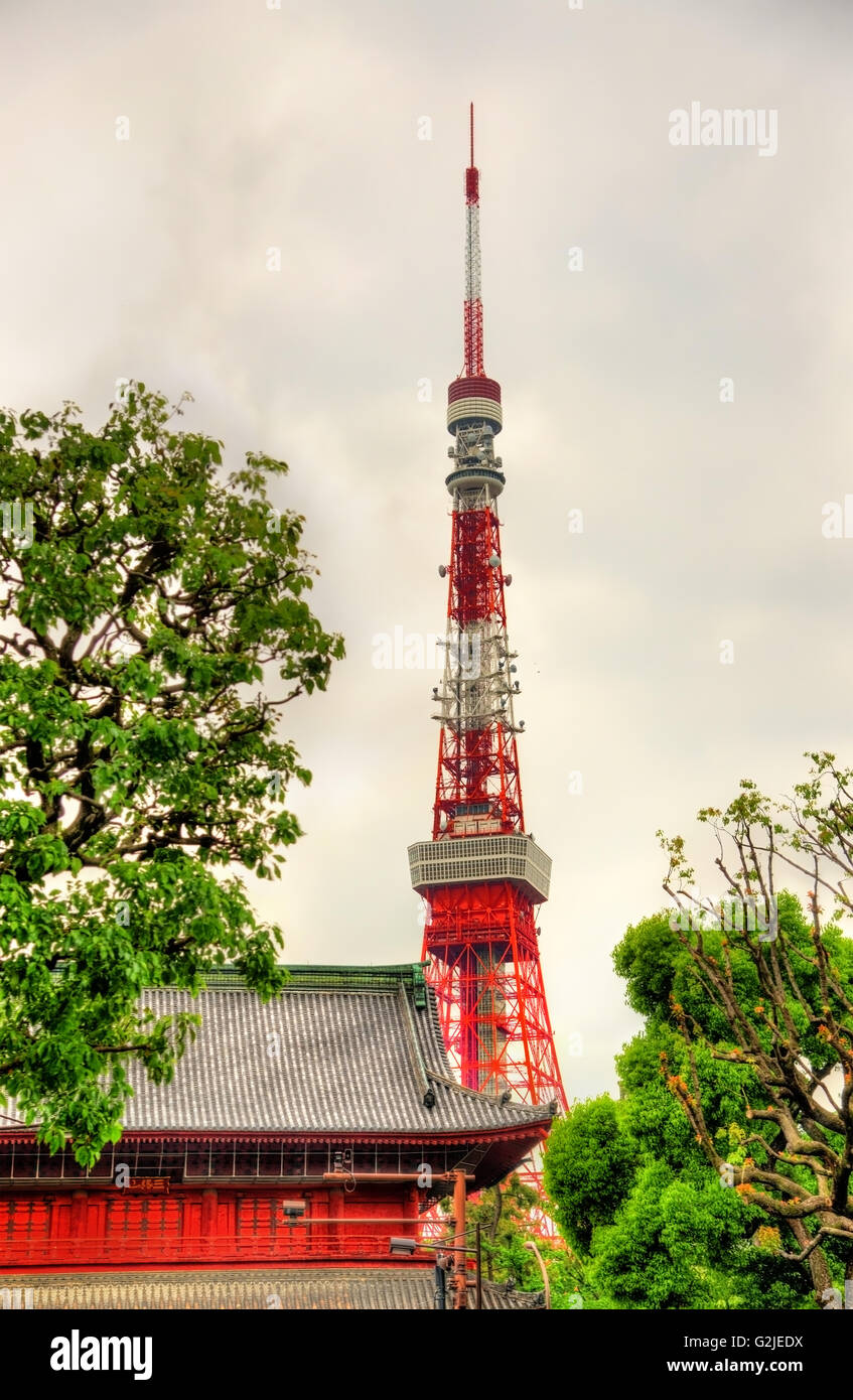 Tokyo Tower above Zojo-ji Temple Stock Photo - Alamy