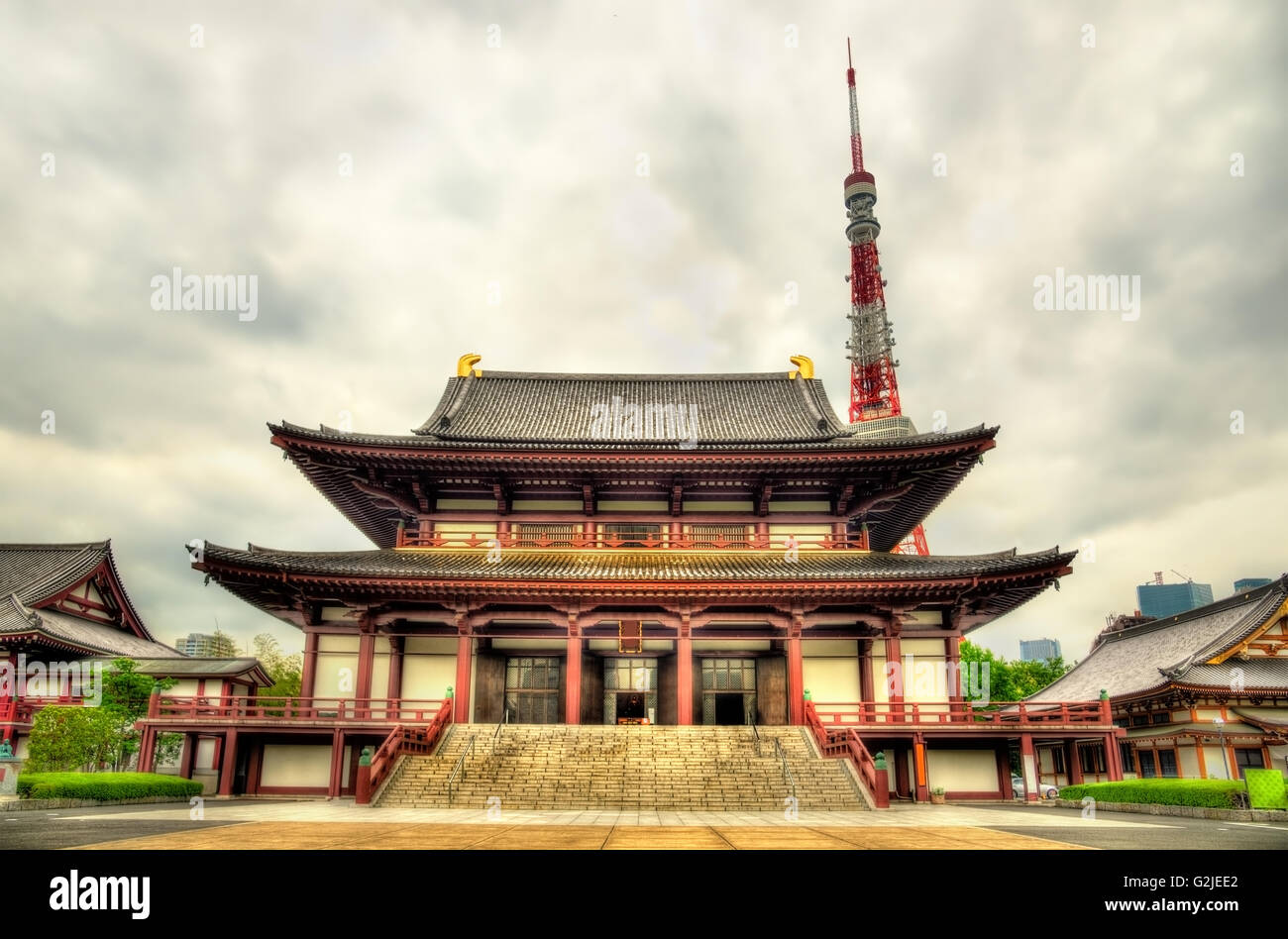 Tokyo Tower above Zojo-ji Temple Stock Photo - Alamy