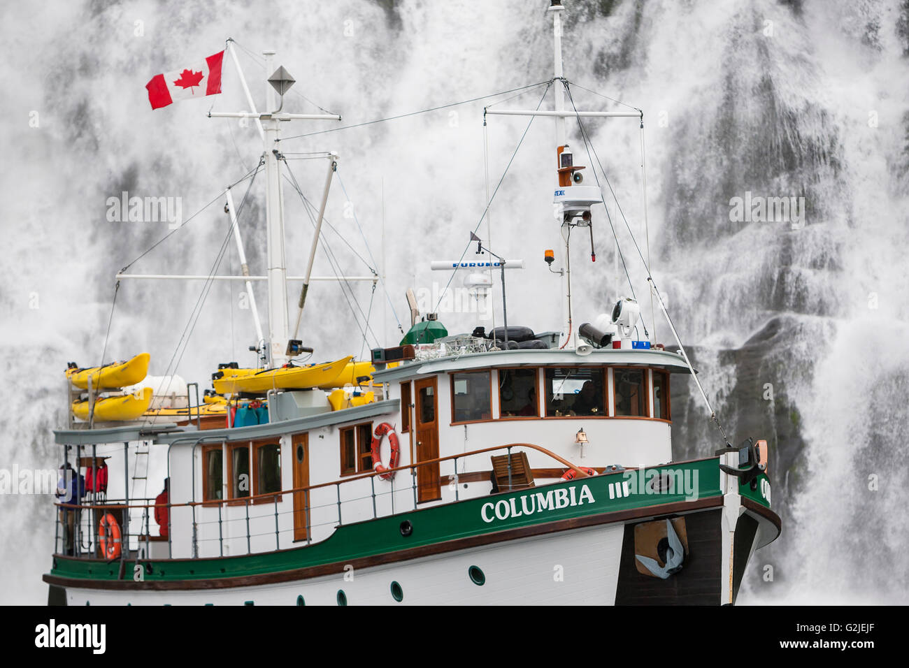 Columbia III steams in close a waterfall while transiting waters in ...