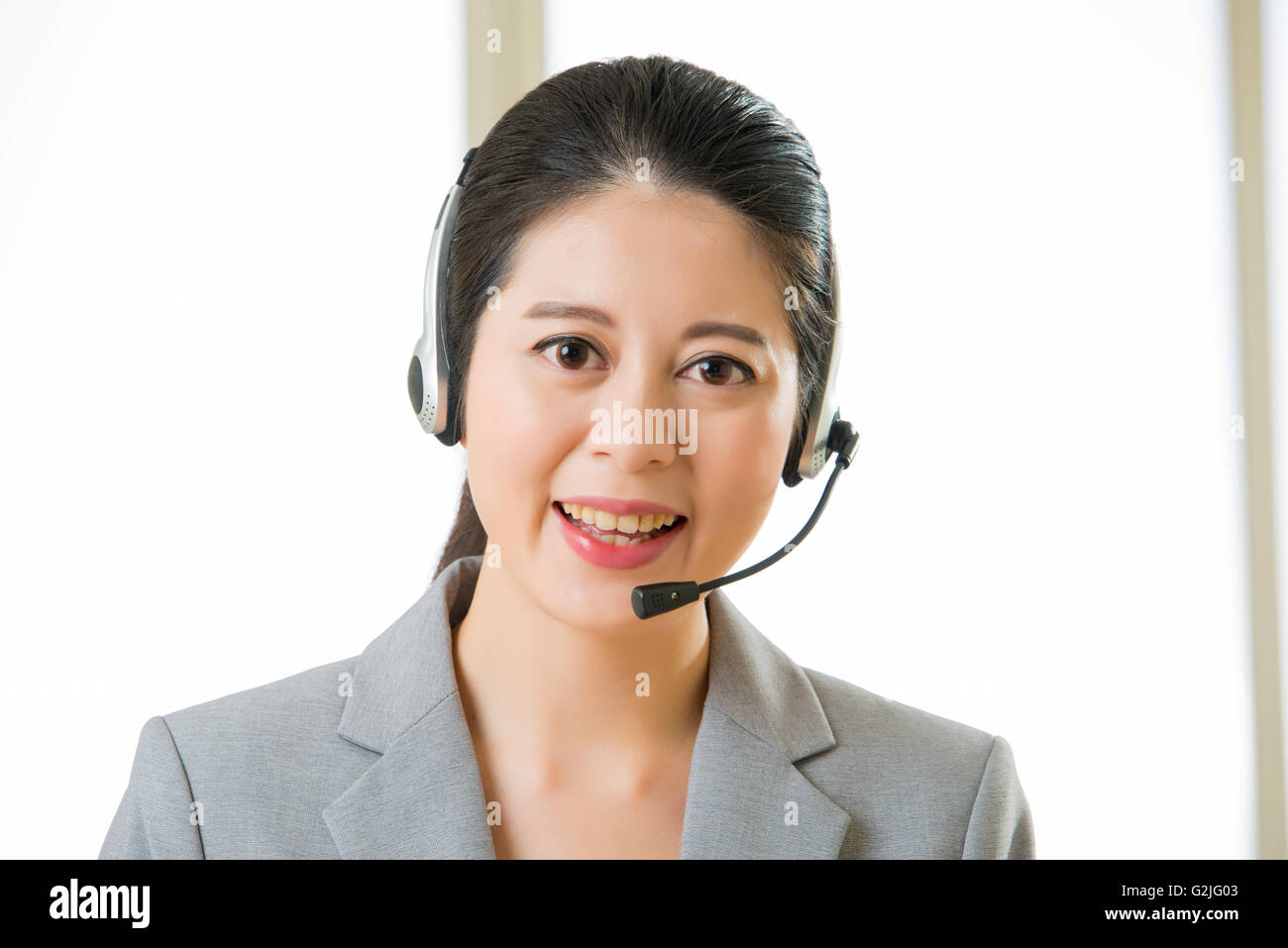 Beautiful asian business customer service woman smiling in office Stock ...