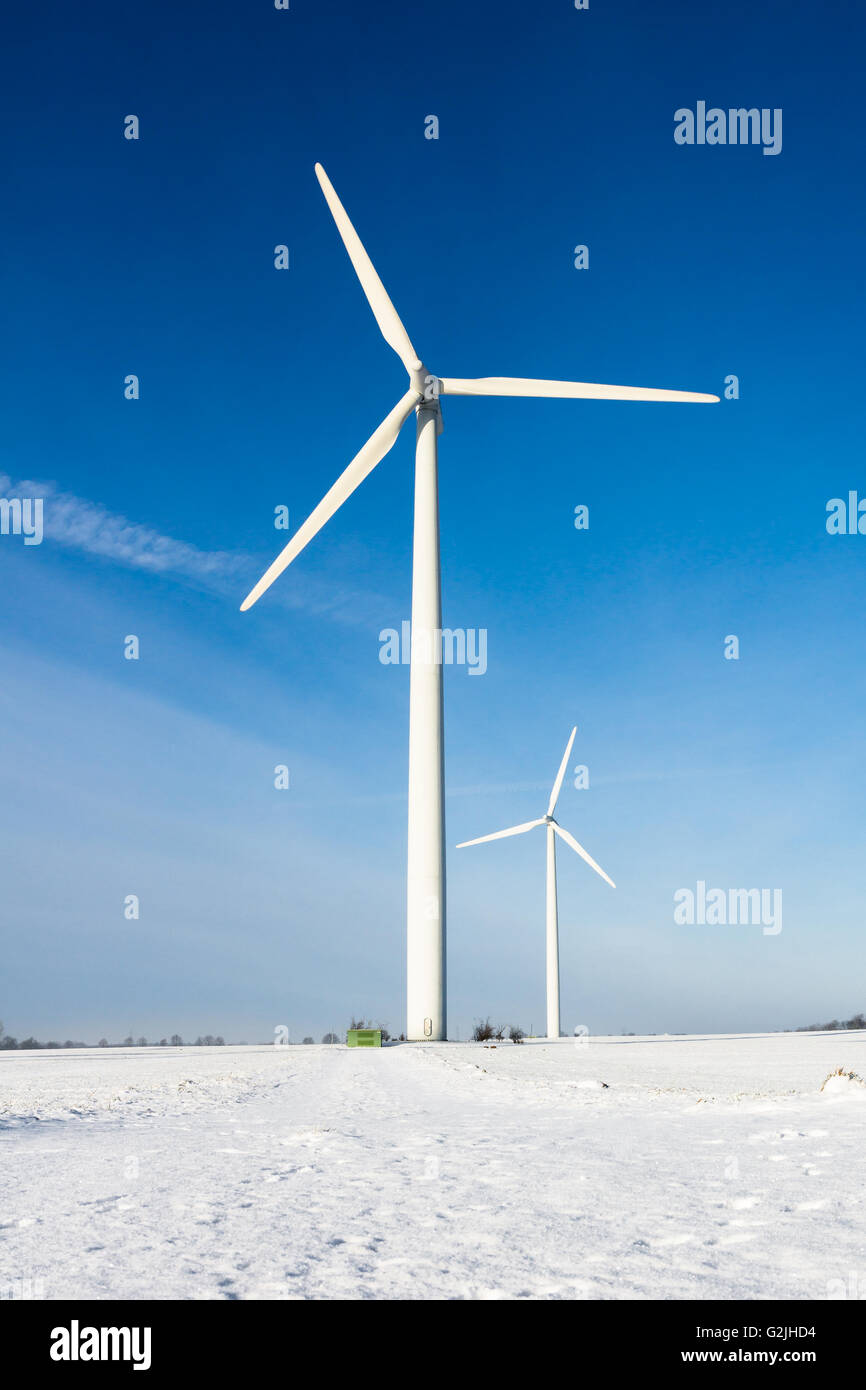 Renewable green energy windfarm turbines snow hi-res stock photography ...
