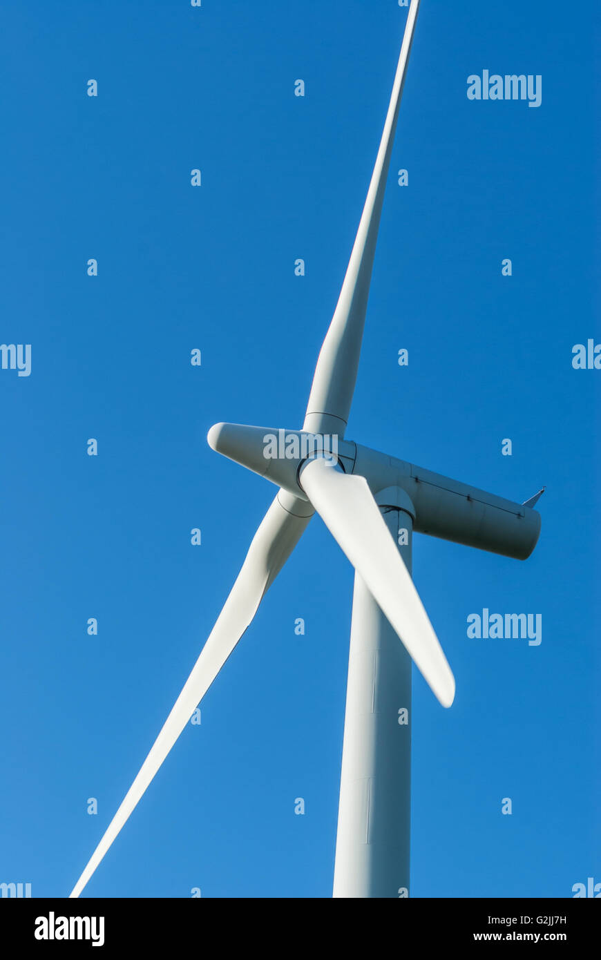 a Wind Turbine in the blue Sky Stock Photo - Alamy
