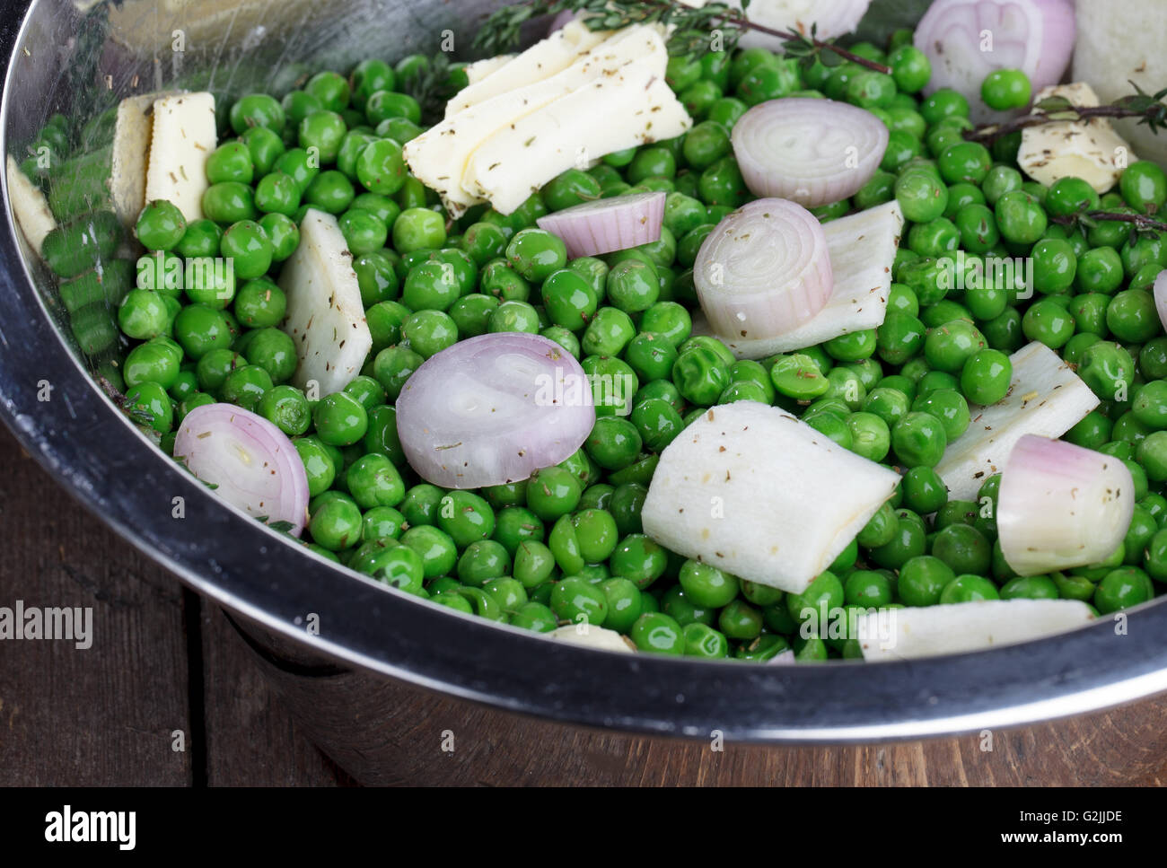 Fresh green peas ready for cooking after a classic french recipe Stock ...