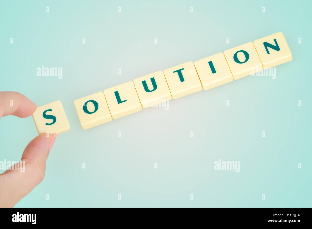 Solution word on blue background Stock Photo - Alamy