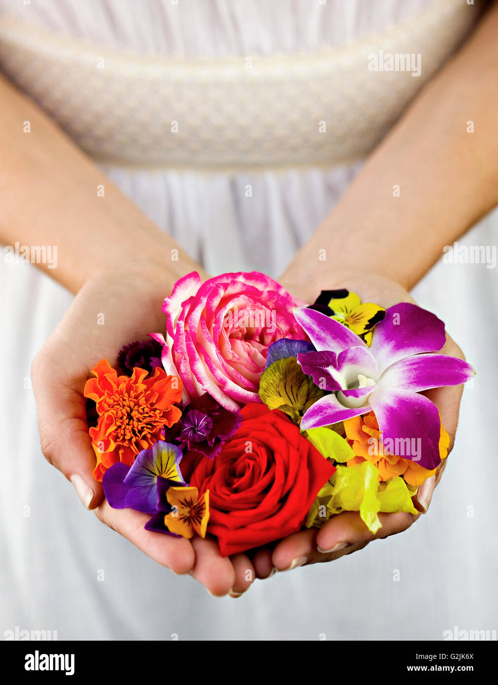 Unrecognizable woman orchid flowers hi-res stock photography and images ...