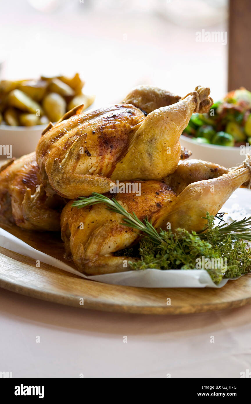 Whole Roasted Chickens Stock Photo - Alamy