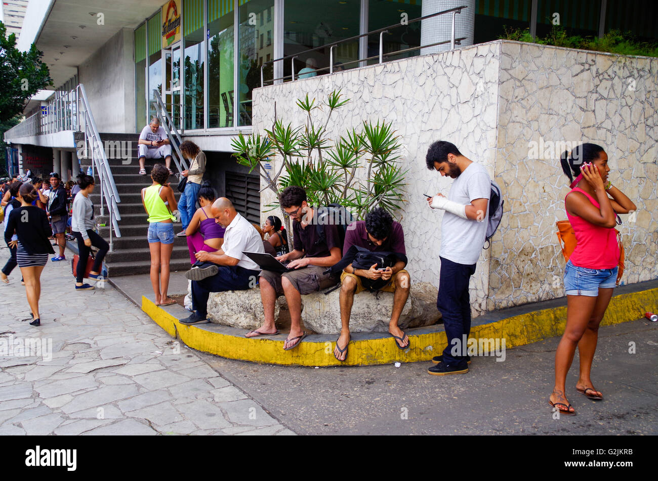 People using restaurant wifi on the street corner in Havana, Cuba (Nov ...