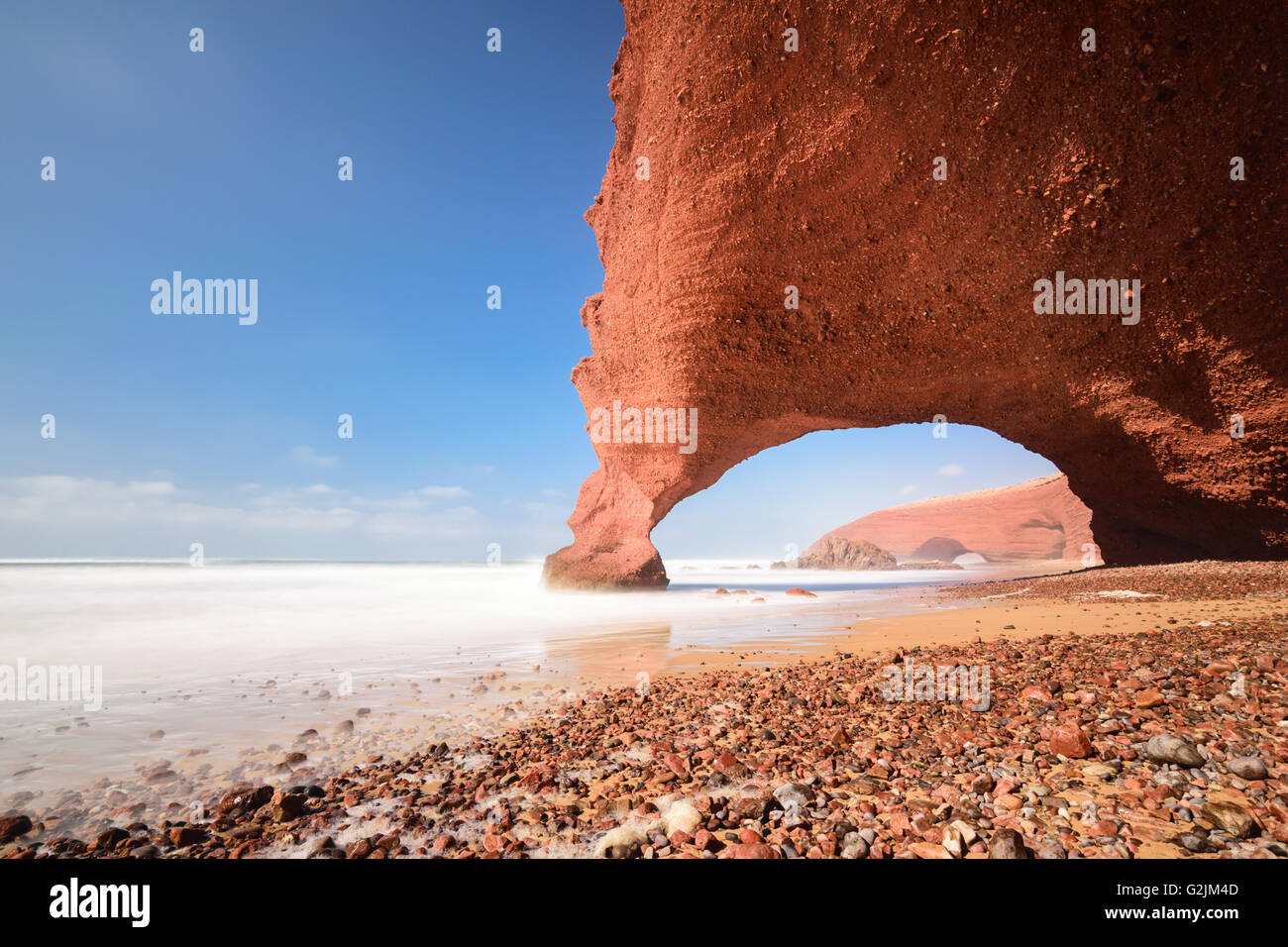 Red arch beach Legzira Stock Photo - Alamy