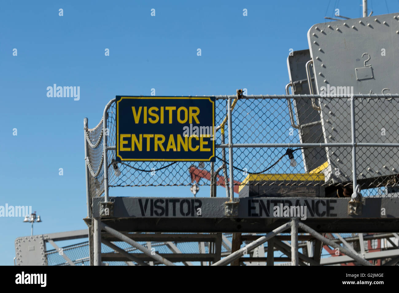 Signage directing Visitor Entrance Stock Photo - Alamy