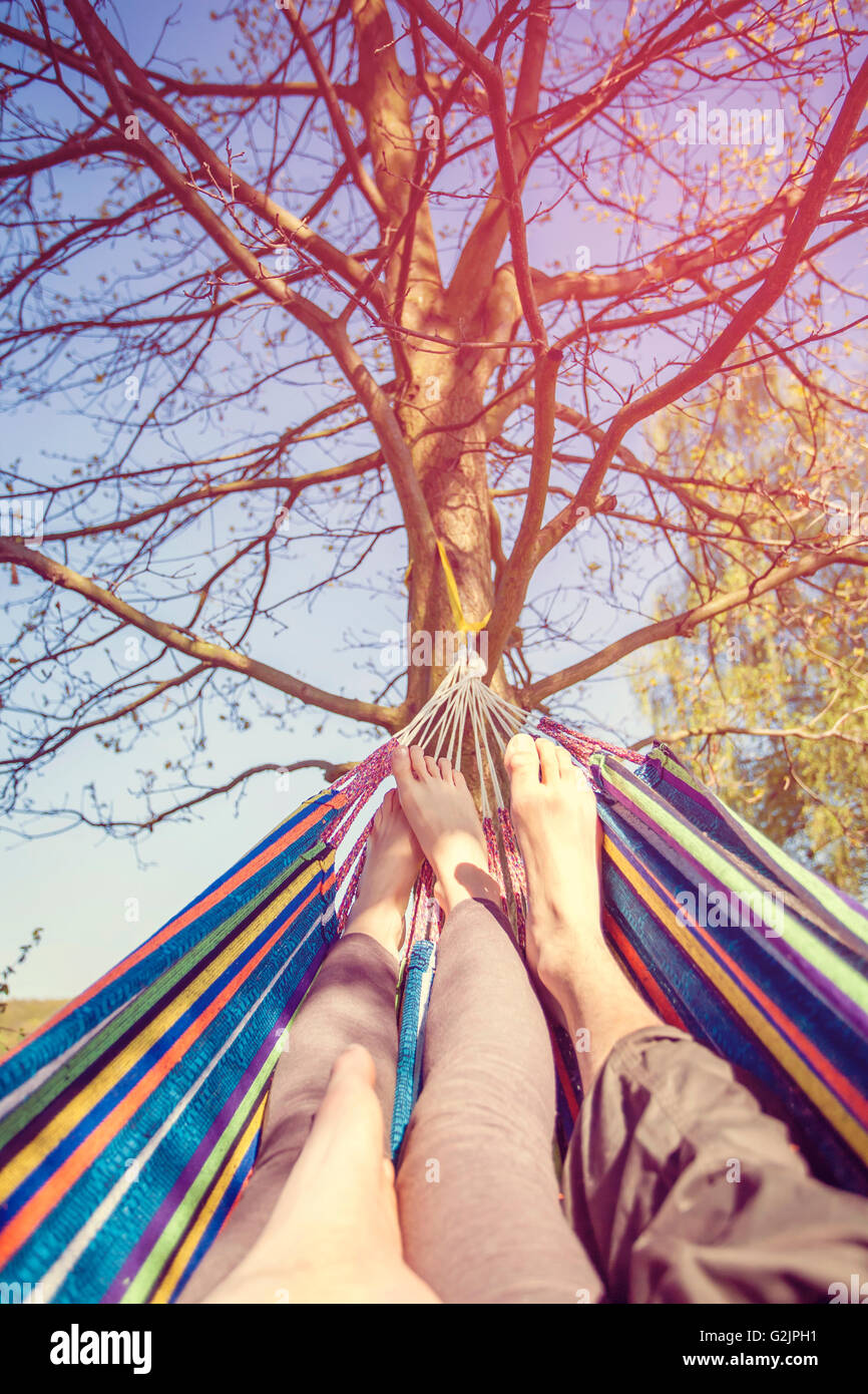 Resting legs in hammock Stock Photo - Alamy