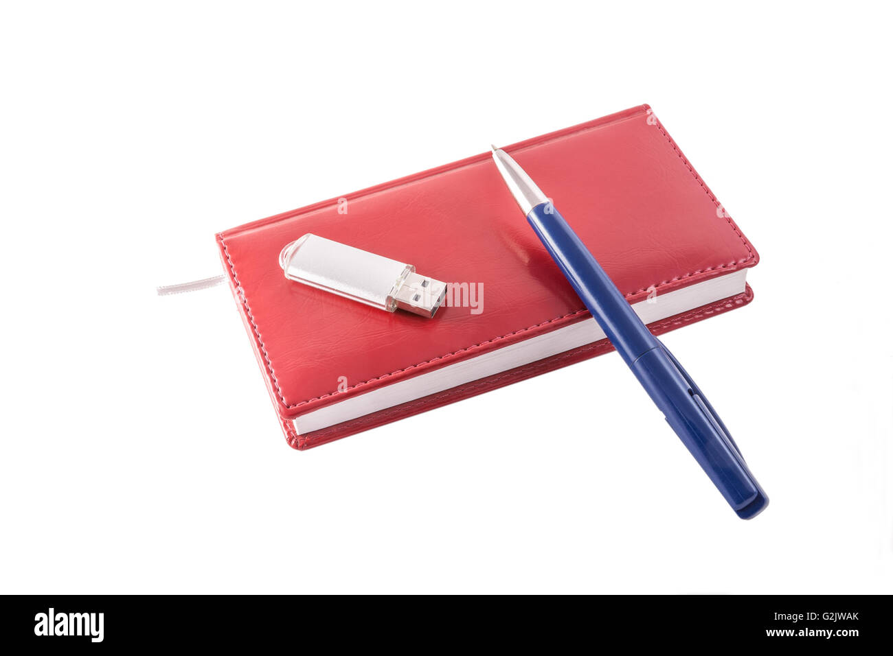 red notebook with the pen Stock Photo - Alamy