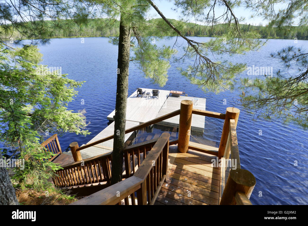 Dock And Muskoka Chairs On Lake Muskoka High Resolution Stock ...