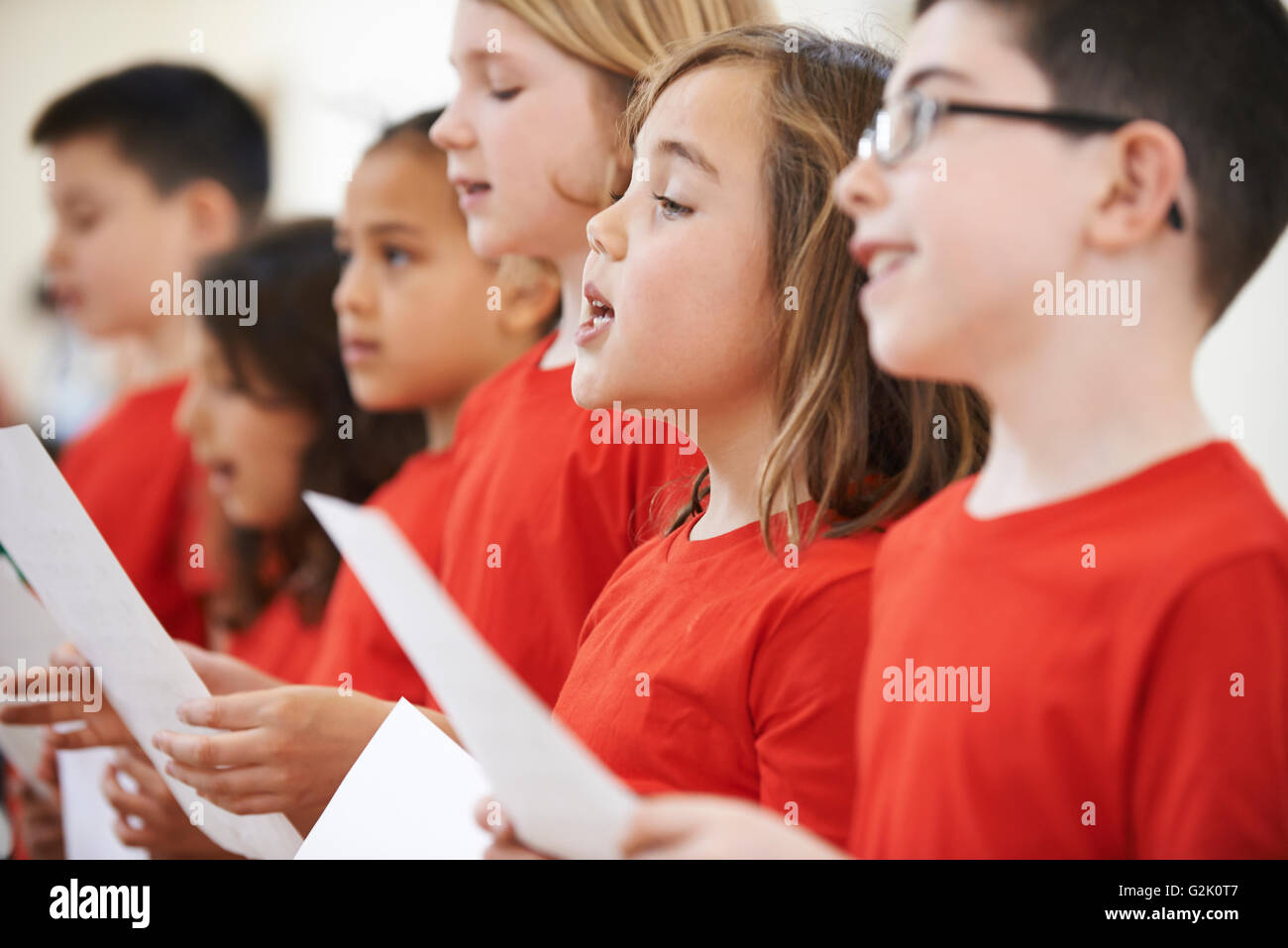 Group Of School Children Singing In Choir Together Stock Photo - Alamy