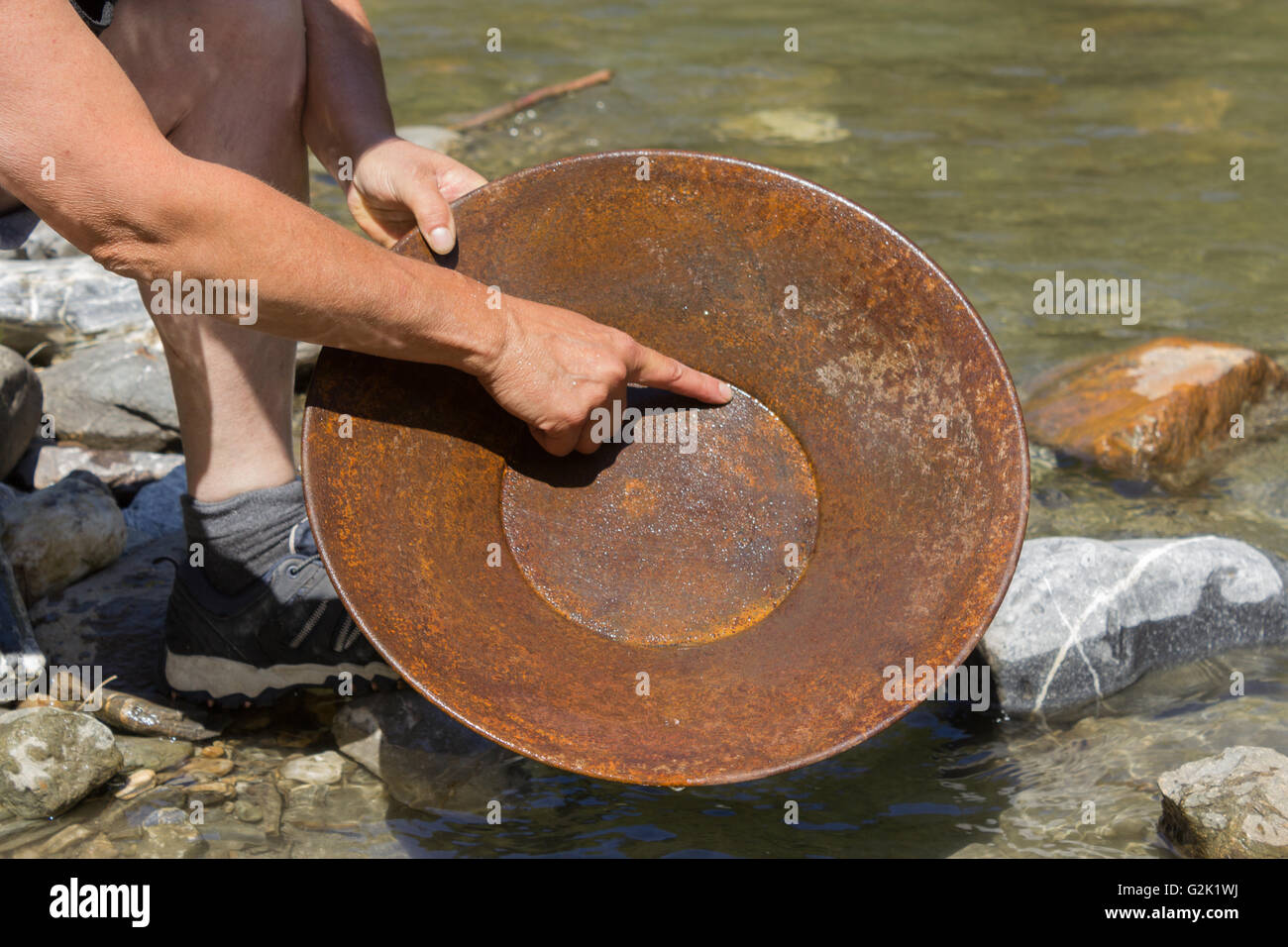 Gold Nugget mining from the River, with a gold pan, and find some big ...