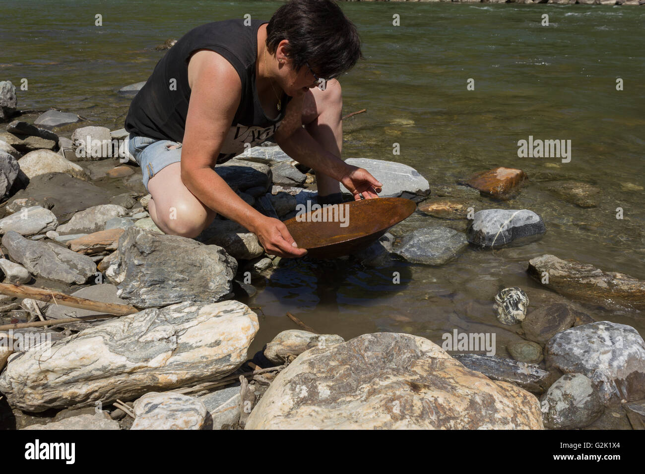 Gold Nugget mining from the River, with a gold pan, and find some big ...