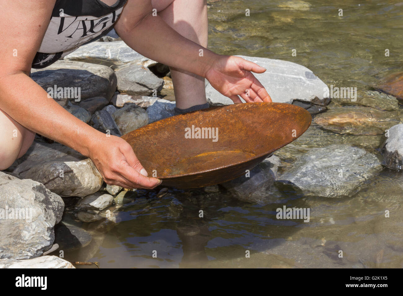 Gold Nugget mining from the River, with a gold pan, and find some big ...