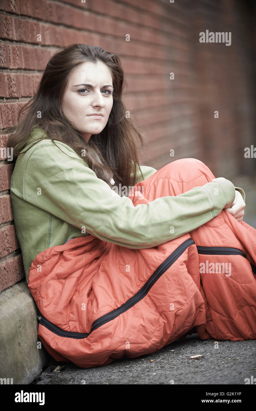 Vulnerable Teenage Girl Sleeping On The Street Stock Photo - Alamy