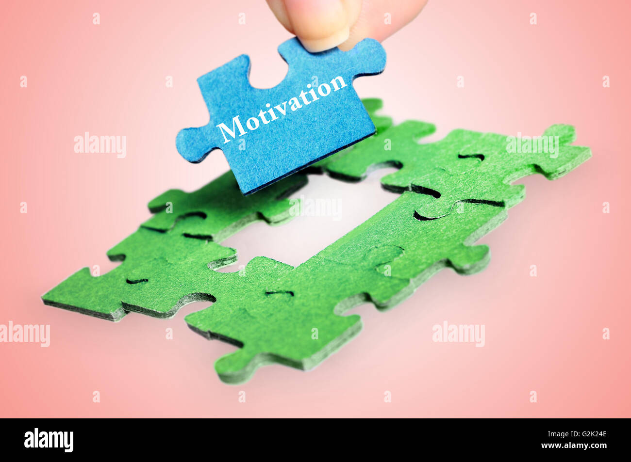Puzzle with Motivation word piece Stock Photo - Alamy
