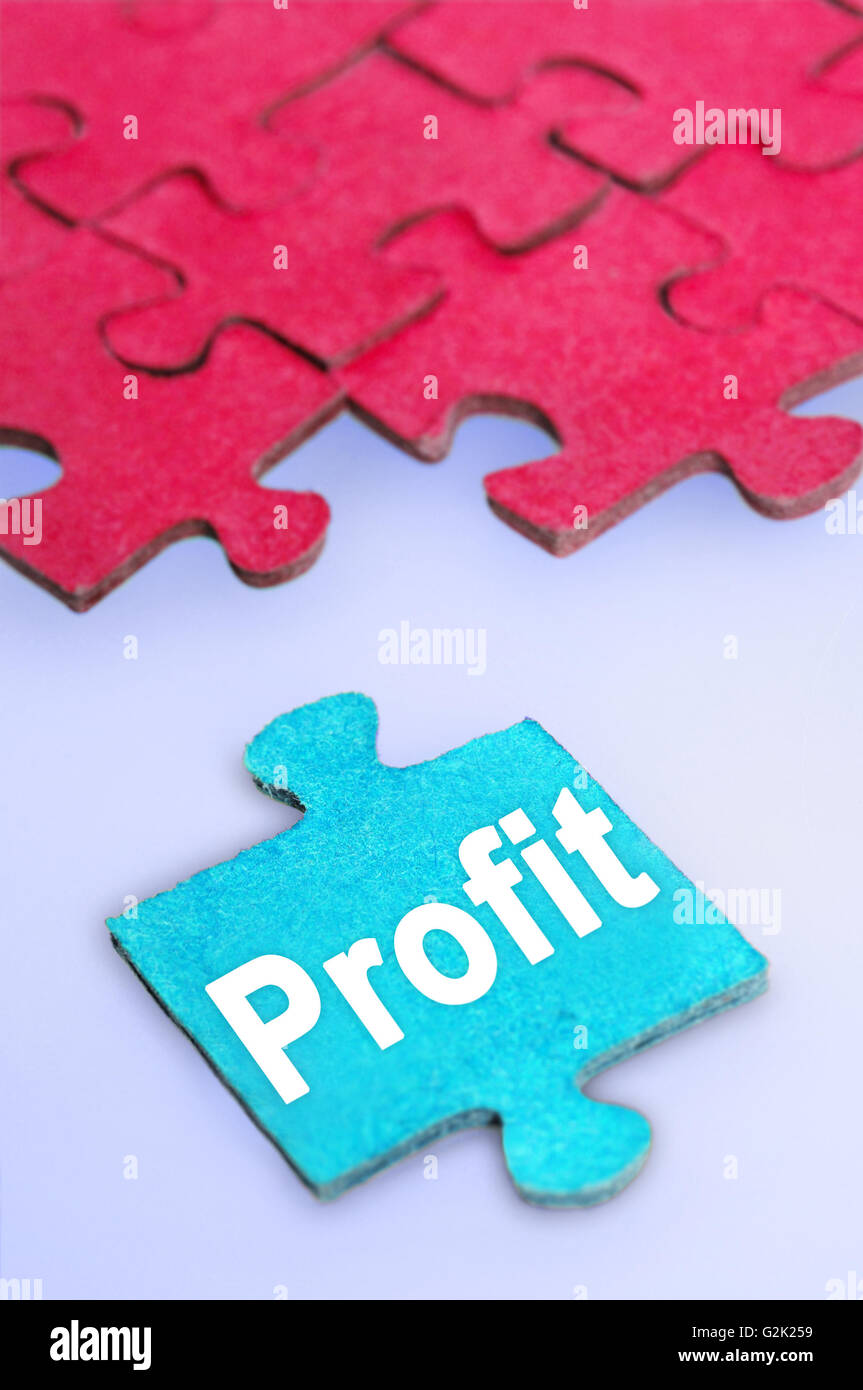 Puzzle with Profit word piece Stock Photo - Alamy