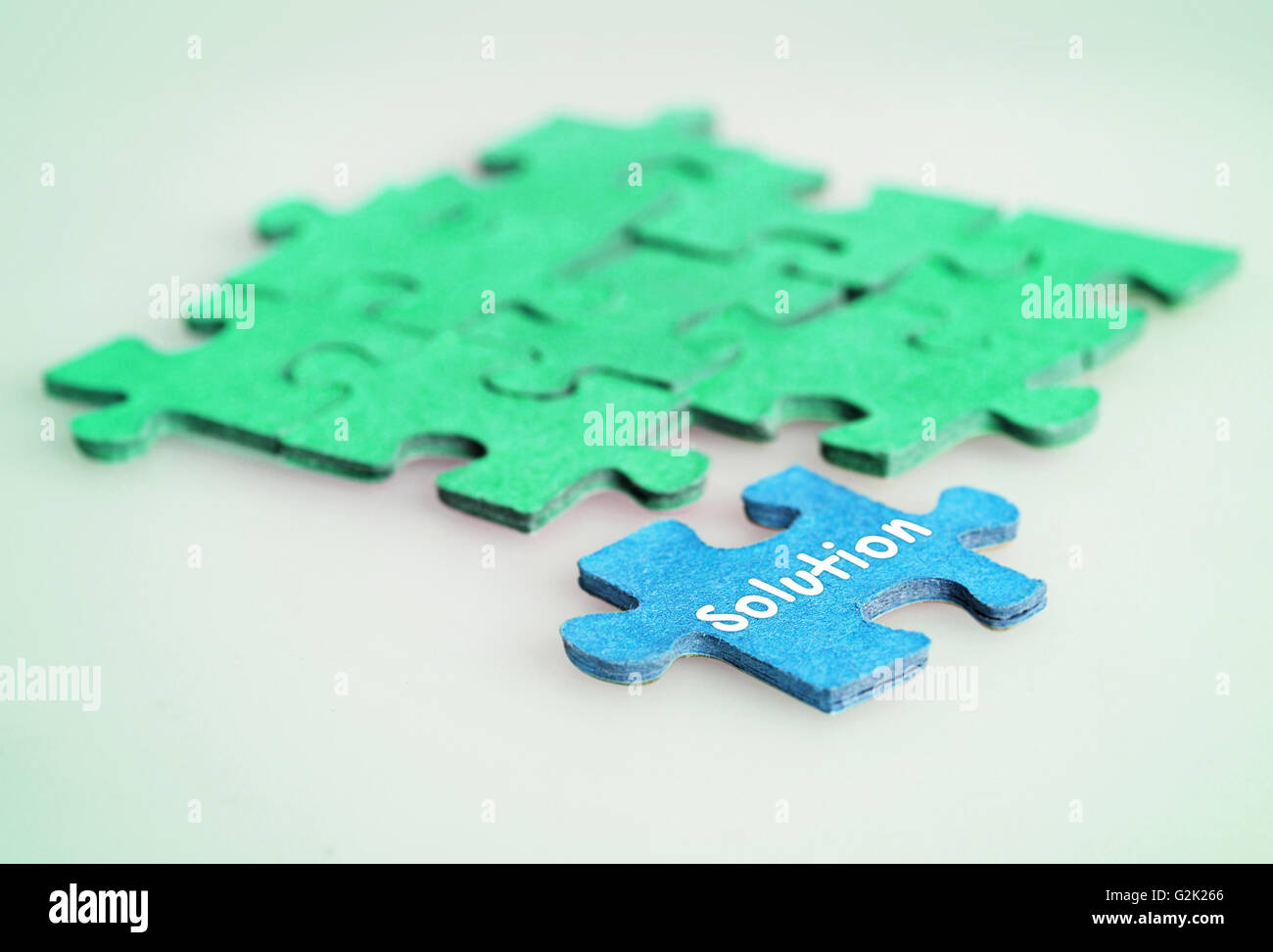 Puzzle with Solution word piece Stock Photo - Alamy