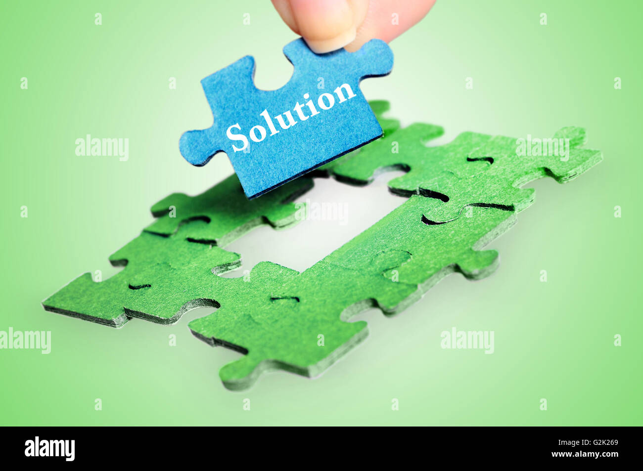 Puzzle with Solution word piece Stock Photo - Alamy