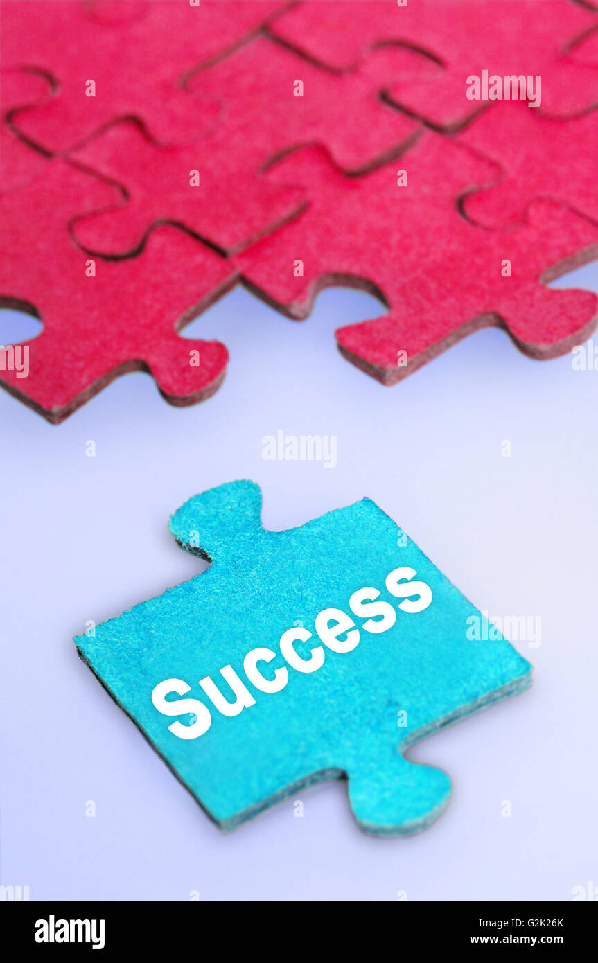 Puzzle with Success word piece Stock Photo - Alamy