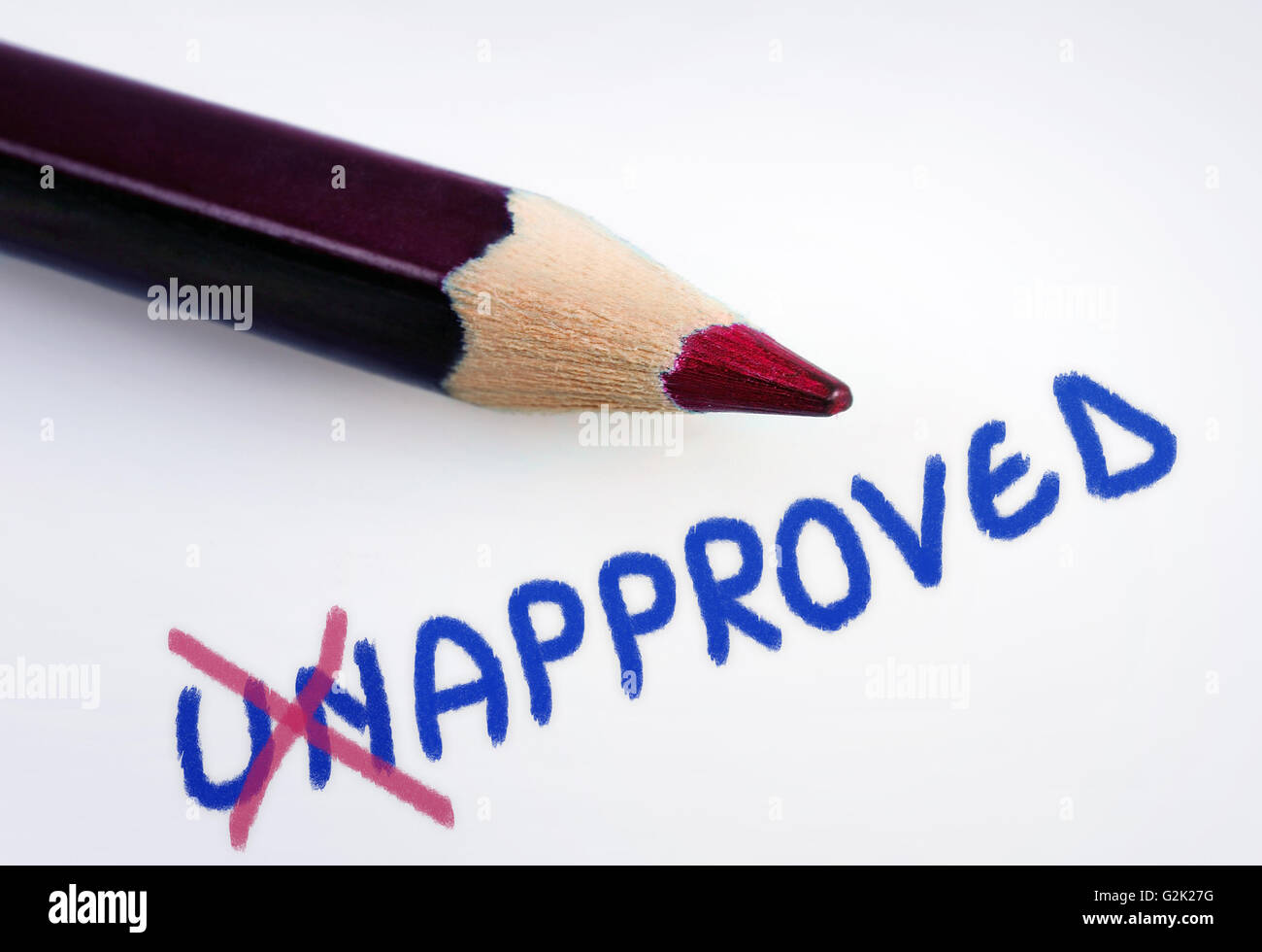Unapproved word on grey background Stock Photo - Alamy