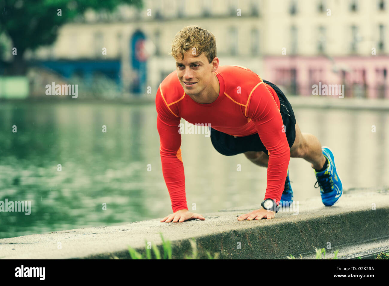 Handsome male runner doing push ups hi-res stock photography and images ...
